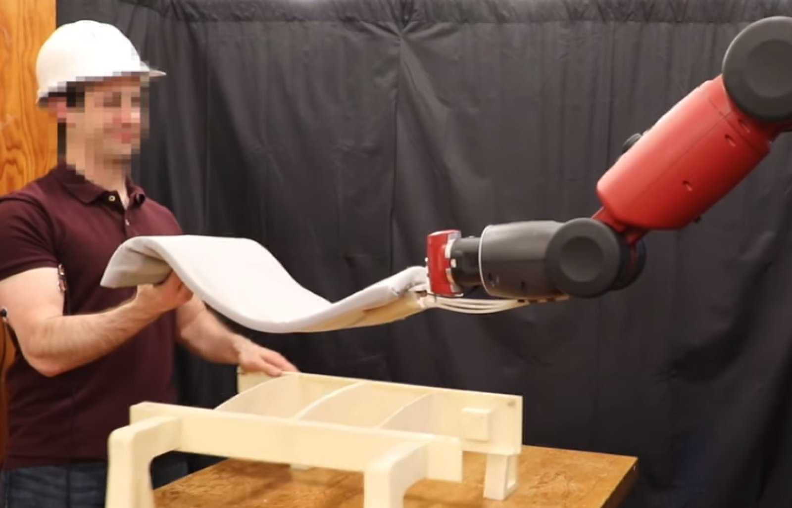 A man and a robot work together: what does it look like?